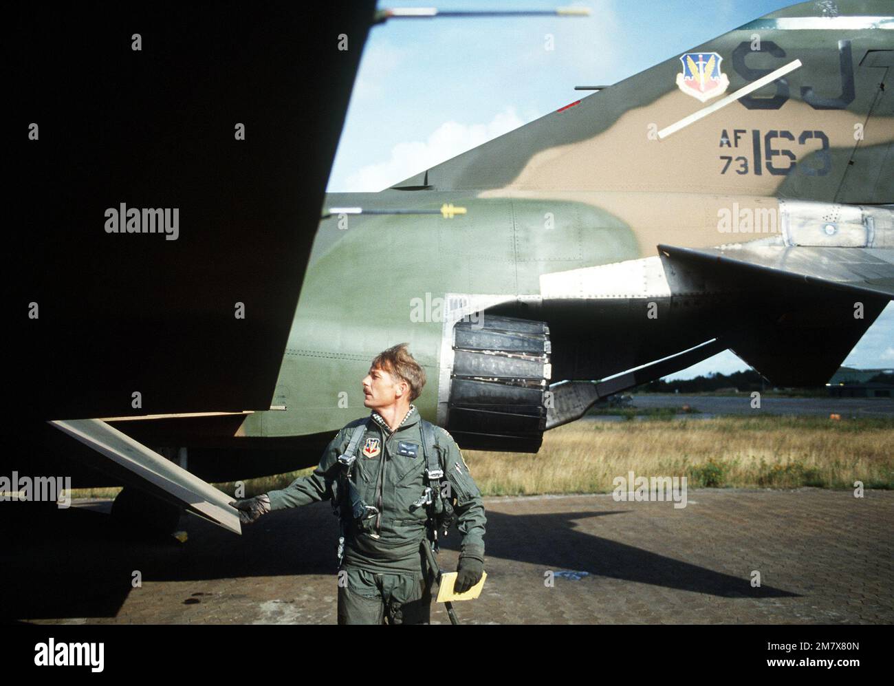 CPT John Denu conducts a preflight inspection of his F-4E Phantom II ...