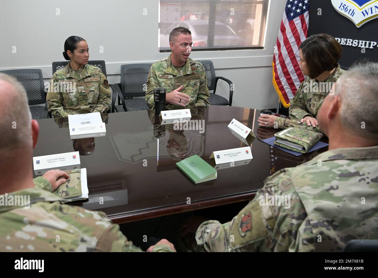 U.S. Air Force Col. Pete Boone, the 156th Wing commander speaks with ...