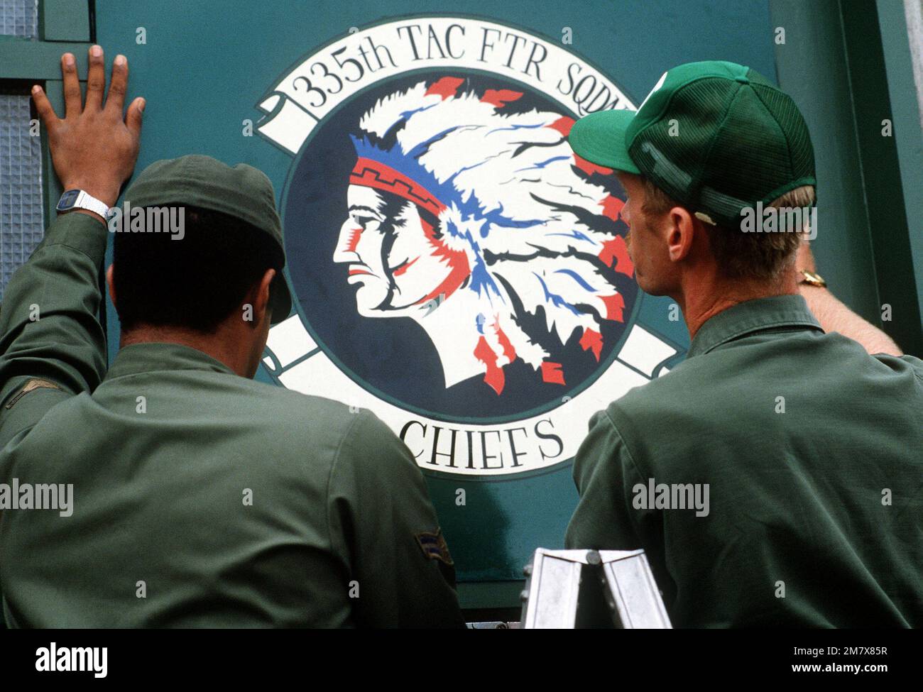A1C William Hall, left, and 1LT Gregory Holmes put up the 335th ...