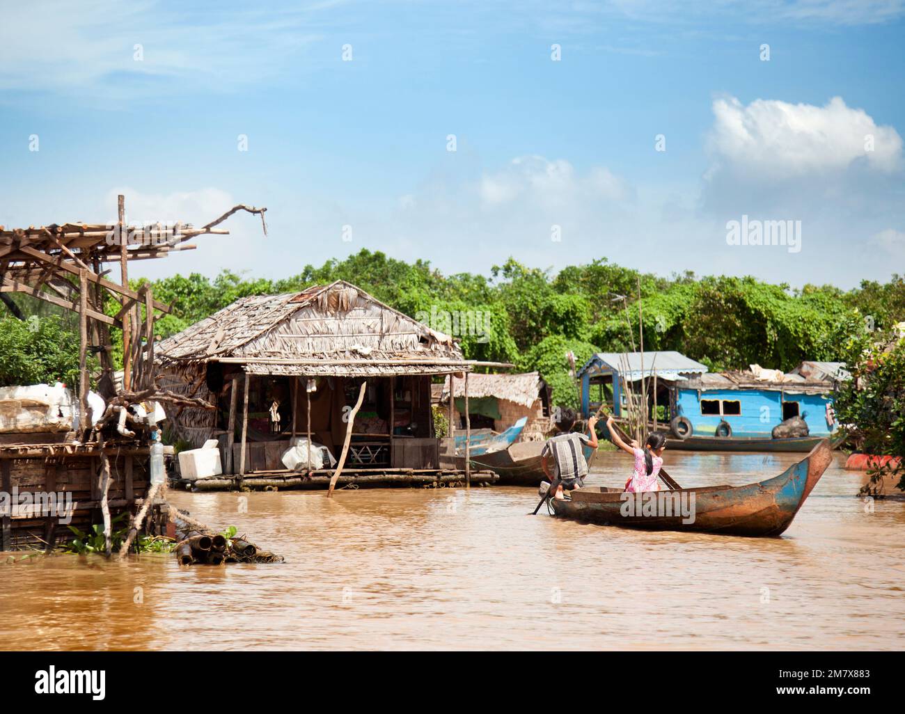 Chong Kneas, Cambodia-August 6, 2009: In a village of houseboats near ...