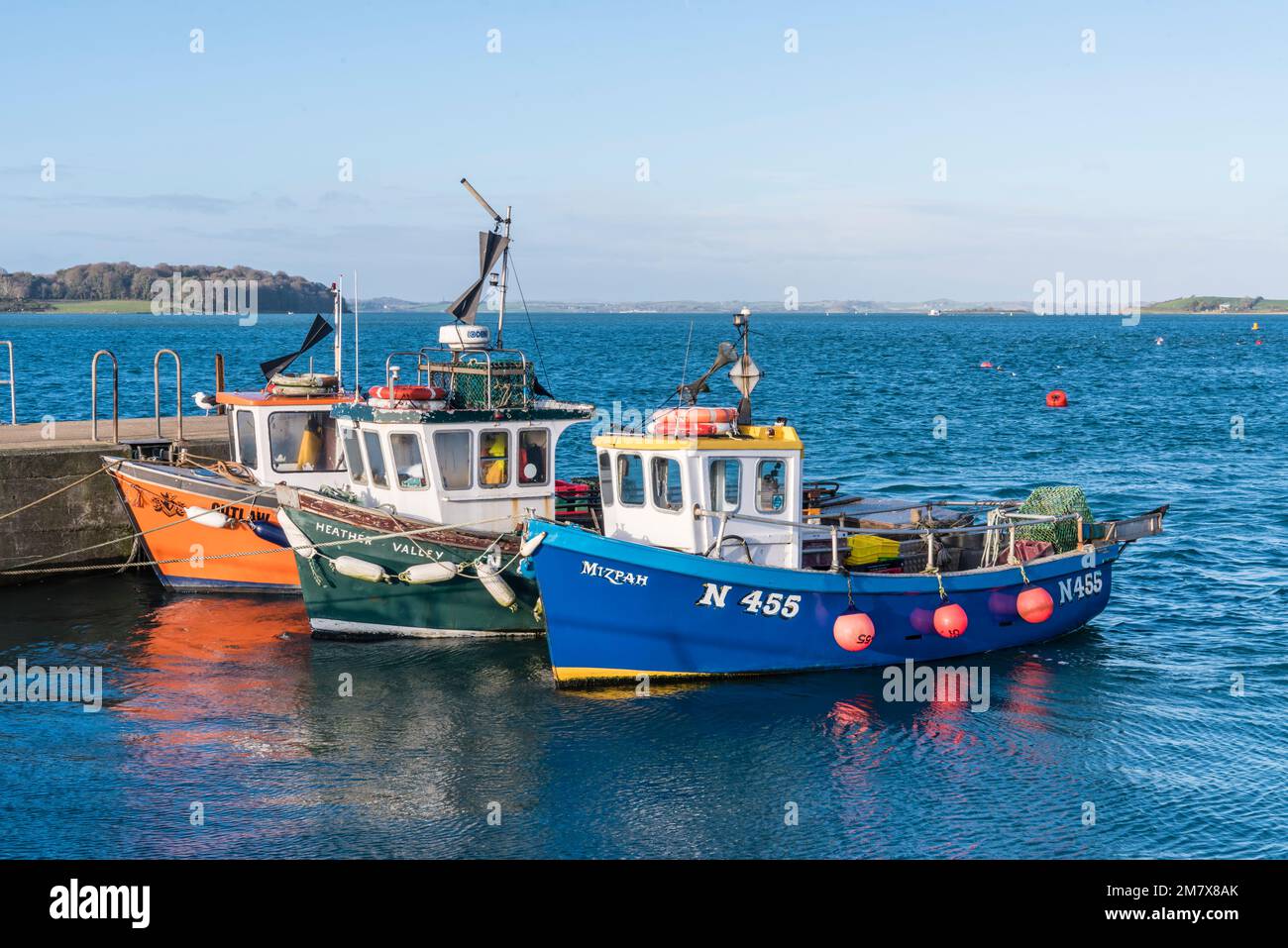 Traditional fishing boats moored at the Small Pier, Portaferry, County ...