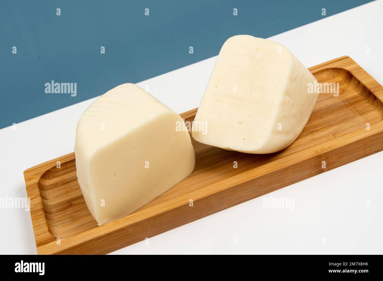 Minas half-cured cheese on a bamboo tray Stock Photo - Alamy