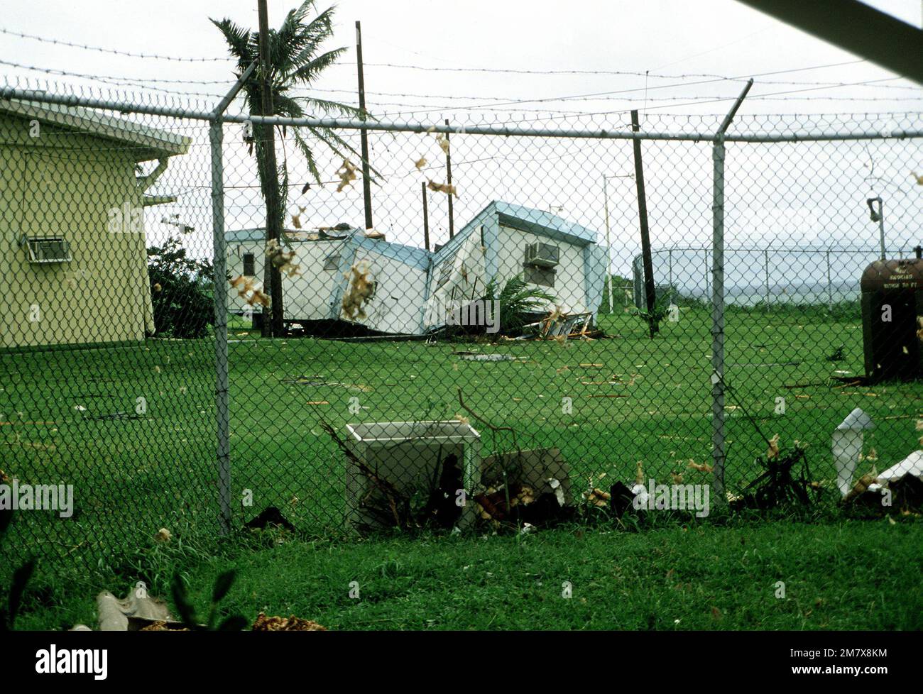 A view of the damage to a trailer caused by Typhoon Faye. Base: Wallace ...