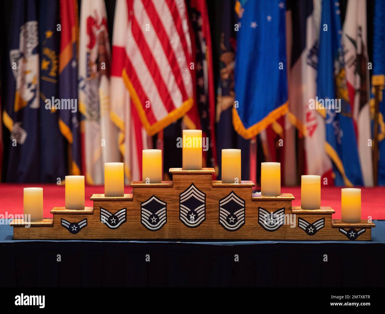 Candles representing the different enlisted ranks are placed on a ...