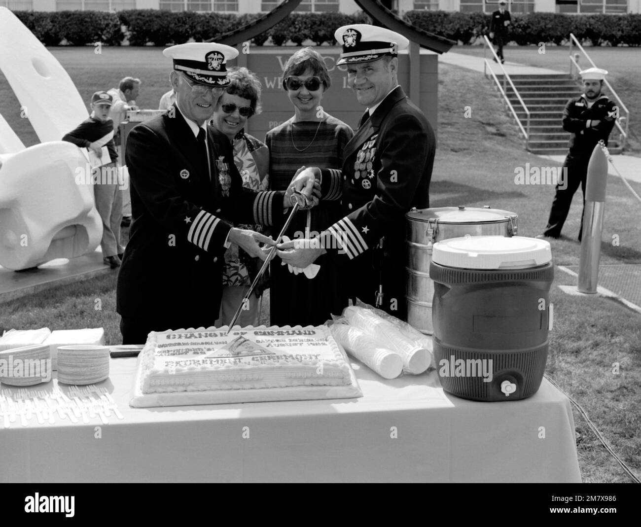 CAPT John R. Emerson (left) and CAPT Donald DeBode cut the cake at the ...