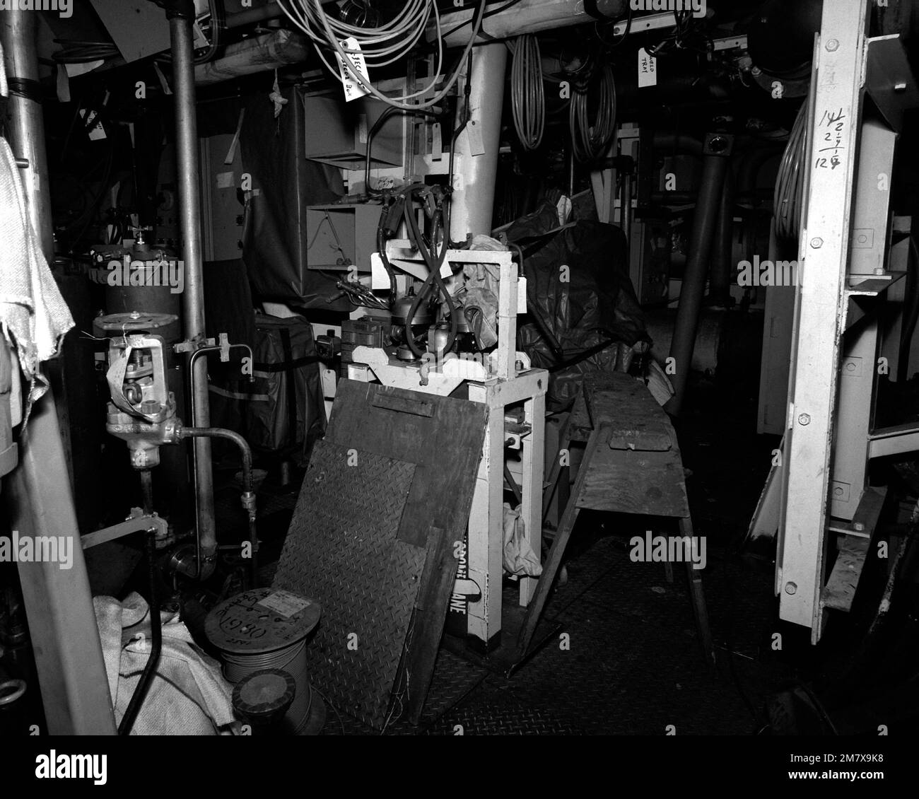 The lower level auxiliary machine room No. 2 aboard the guided missile ...