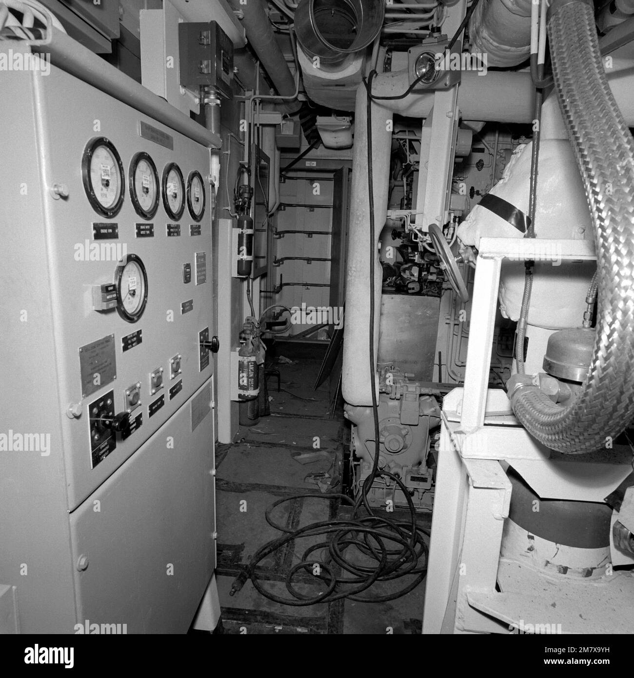 The No. 2 lower level auxiliary machinery room aboard the guided ...