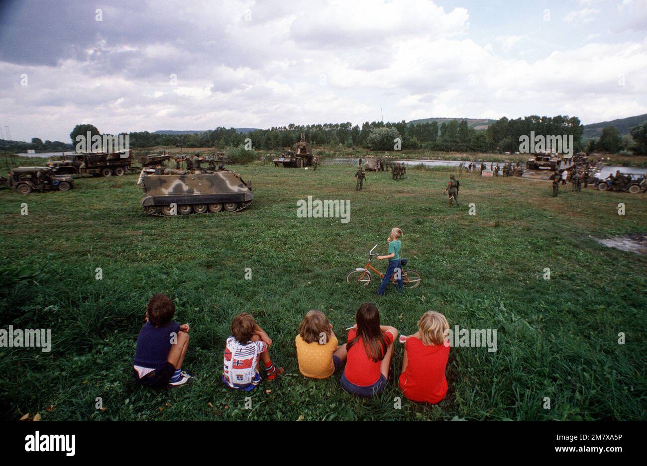 U.S. Army armored vehicles, M-113 Armored Personnel Carriers, jeeps ...