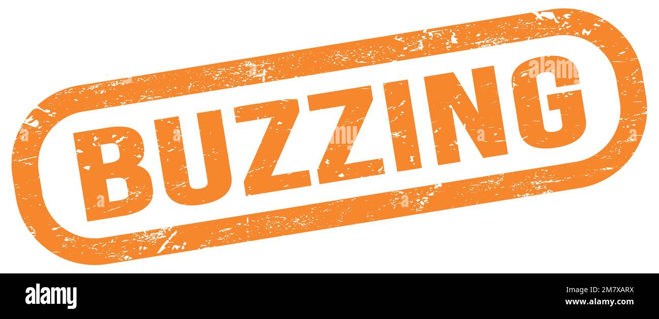 BUZZING, text on orange rectangle stamp sign Stock Photo - Alamy