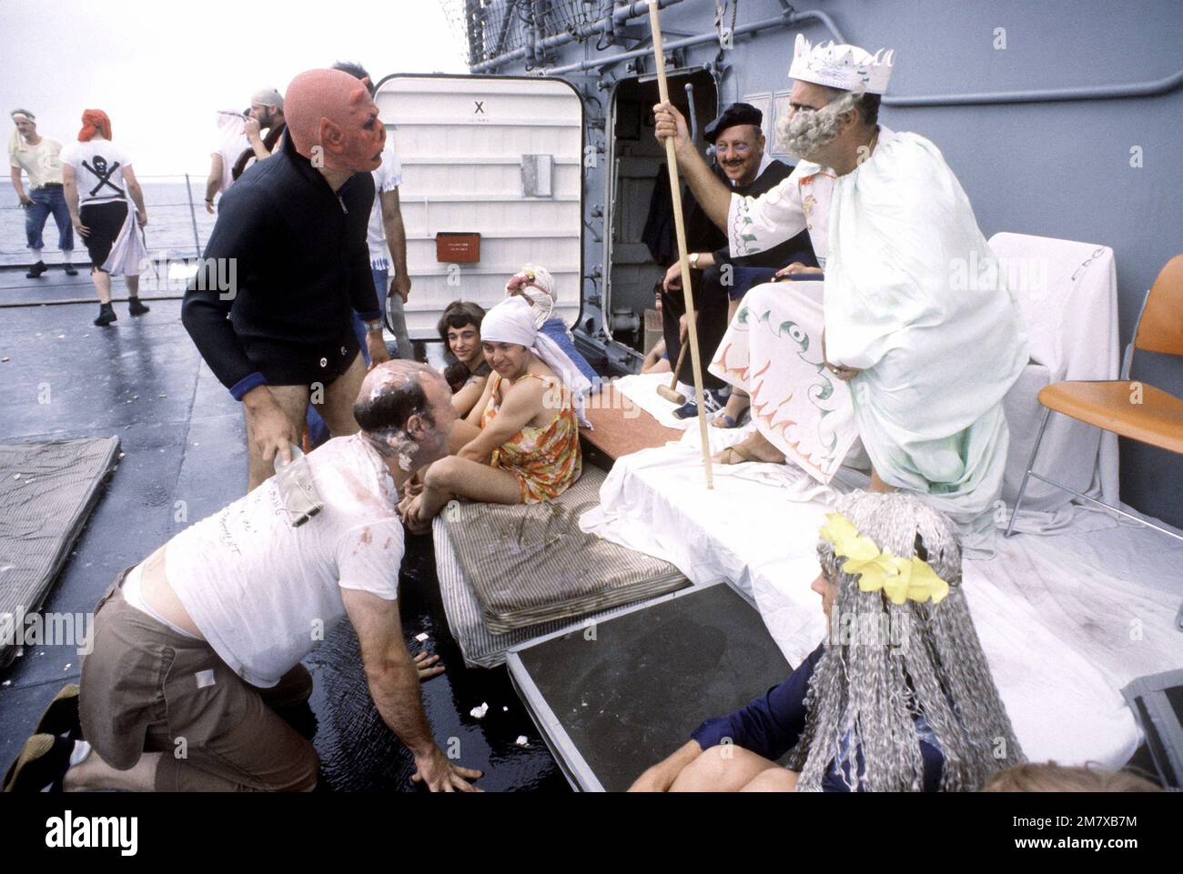 Crewmen aboard the destroyer USS ARTHUR W. RADFORD (DD-968) participate ...