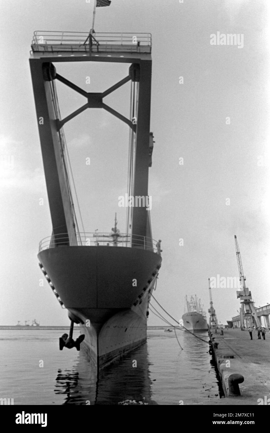 A view of the tank landing ship USS SAGINAW (LST-1188) tied at the pier ...