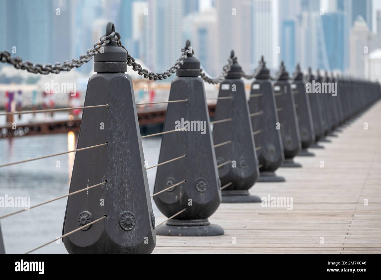 Wooden chain pillar on dock. Fencing Chain wall. Selective Focus Stock ...