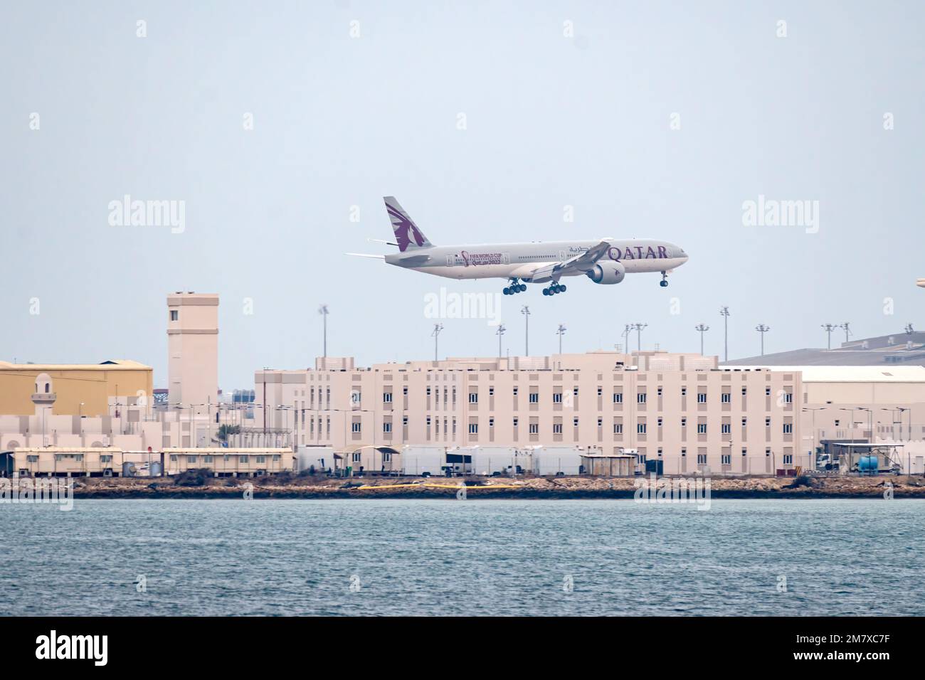 Qatar Air Flight landing at Hamad International Airport Stock Photo - Alamy