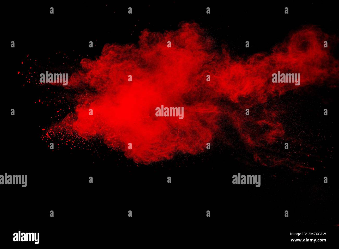Red powder explosion on black background Stock Photo - Alamy