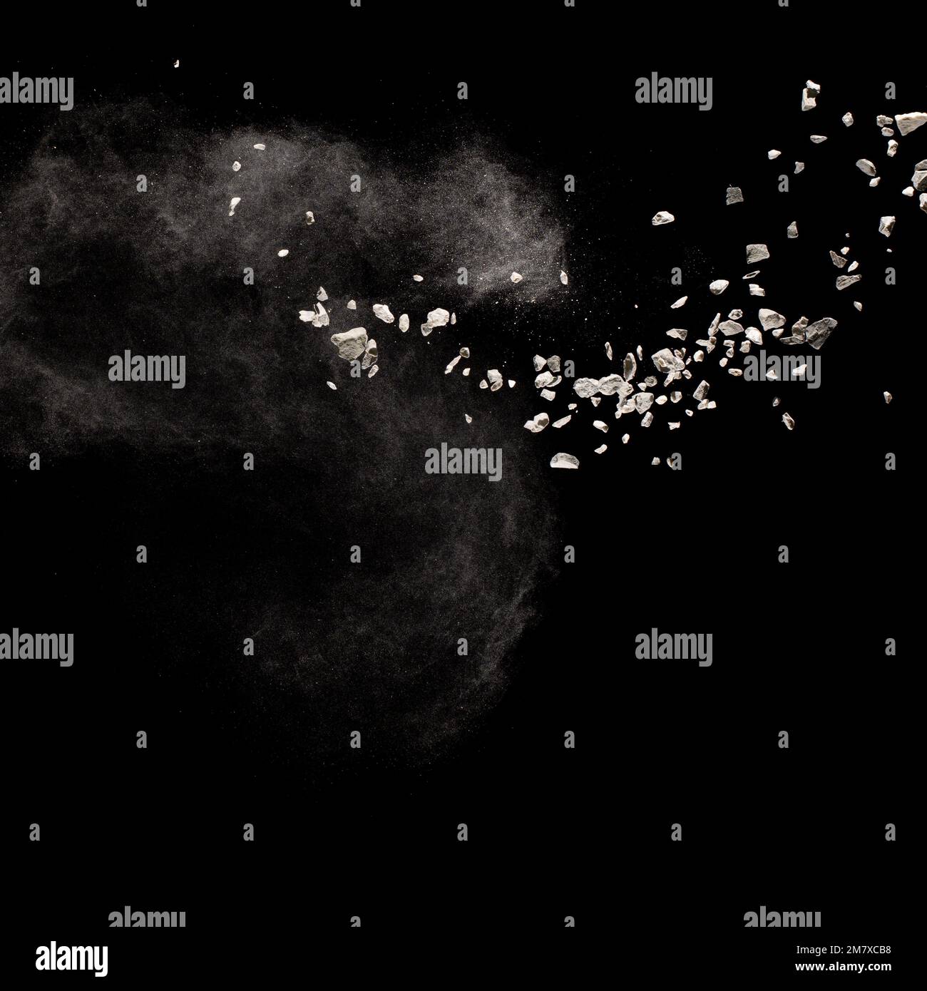 Mixed stone explosion on black background Stock Photo - Alamy