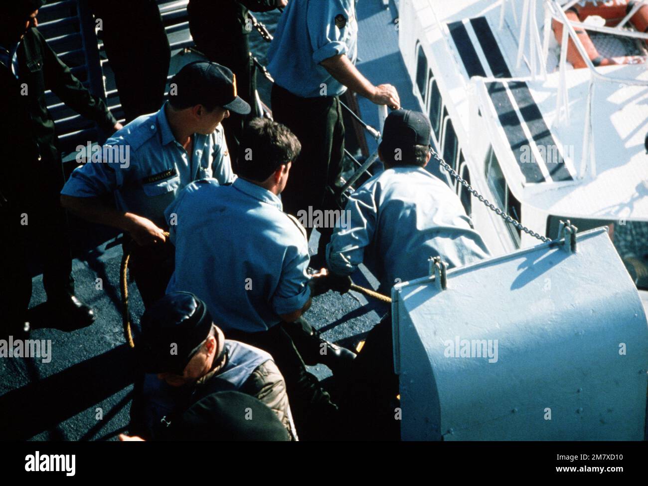 Crewmen aboard a ship from the Standing Naval Forces Atlantic ...