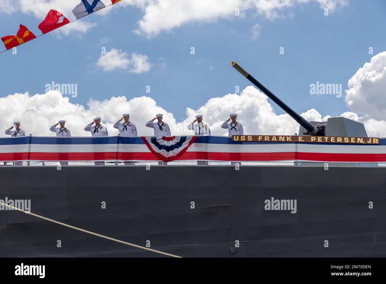 U.S. Sailors assigned to the USS Frank E. Petersen Jr. (DDG 121) man ...