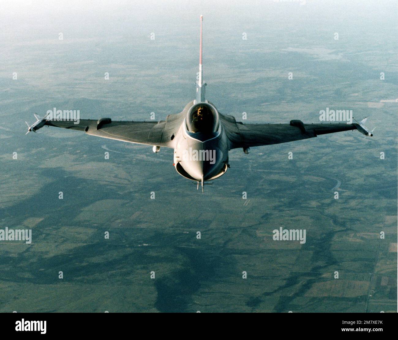 An air-to-air top front view of an F-16XL Fighting Falcon prototype ...