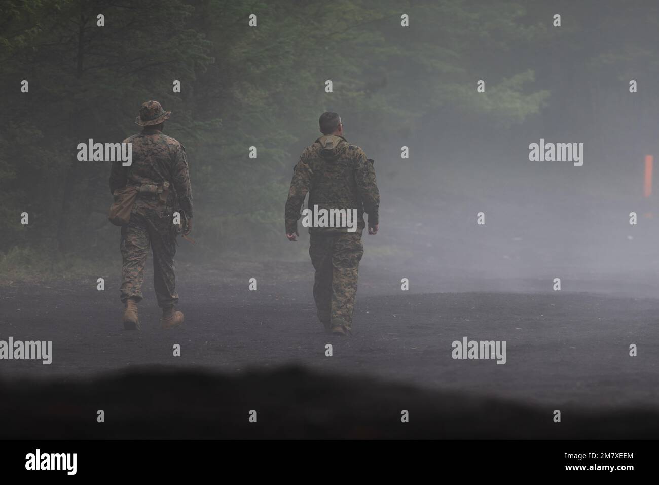 U.S. Marine Corps CWO2 Keran Morrison (left), an explosive ordnance ...