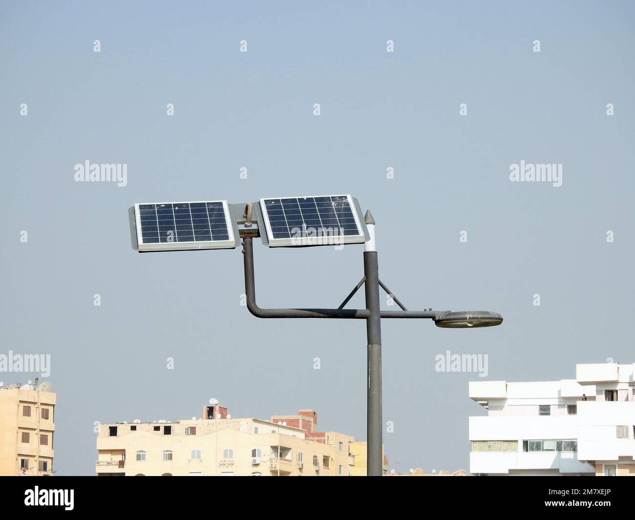 lamppost powered by clean energy of solar cells panel, or photovoltaic ...