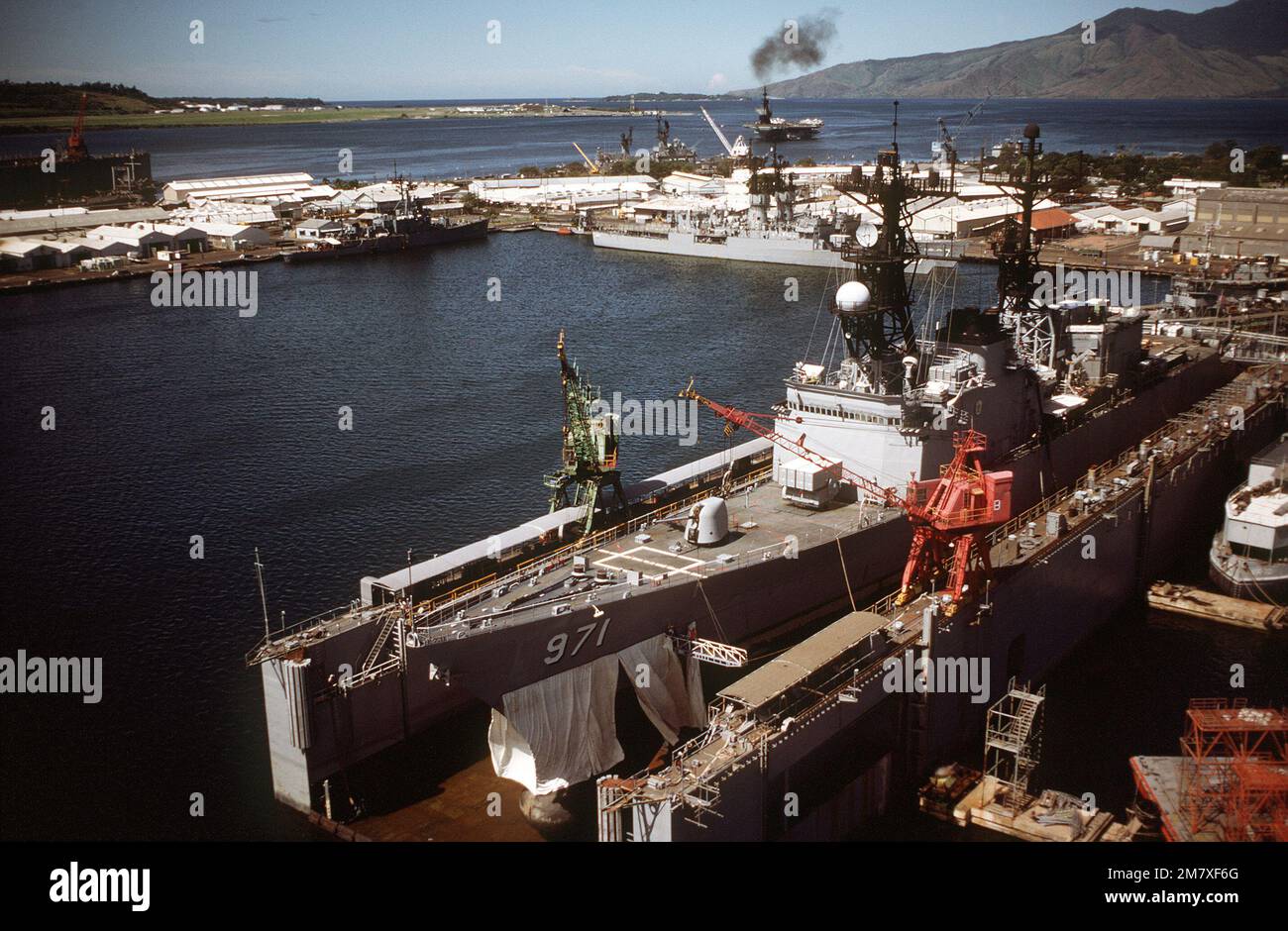 An aerial view of the aircraft carrier USS MIDWAY (CV-41) approaching ...