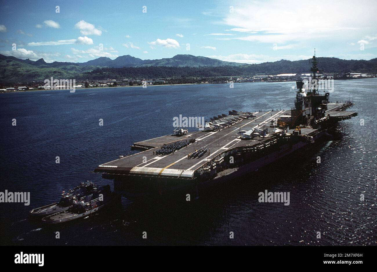 A starboard quarter view of the aircraft carrier USS MIDWAY (CV-41 ...