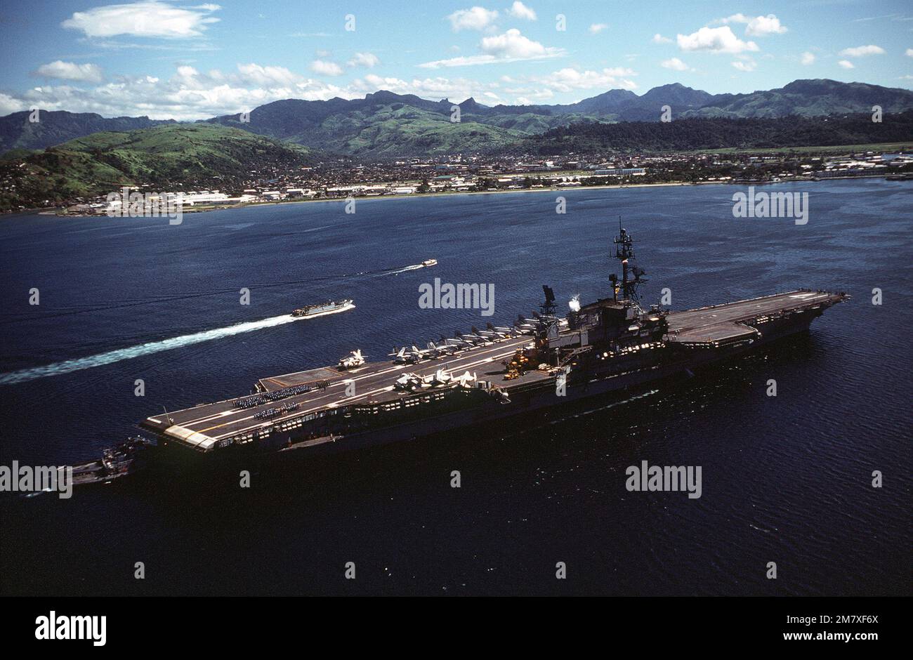 A starboard quarter view of the aircraft carrier USS MIDWAY (CV-41 ...