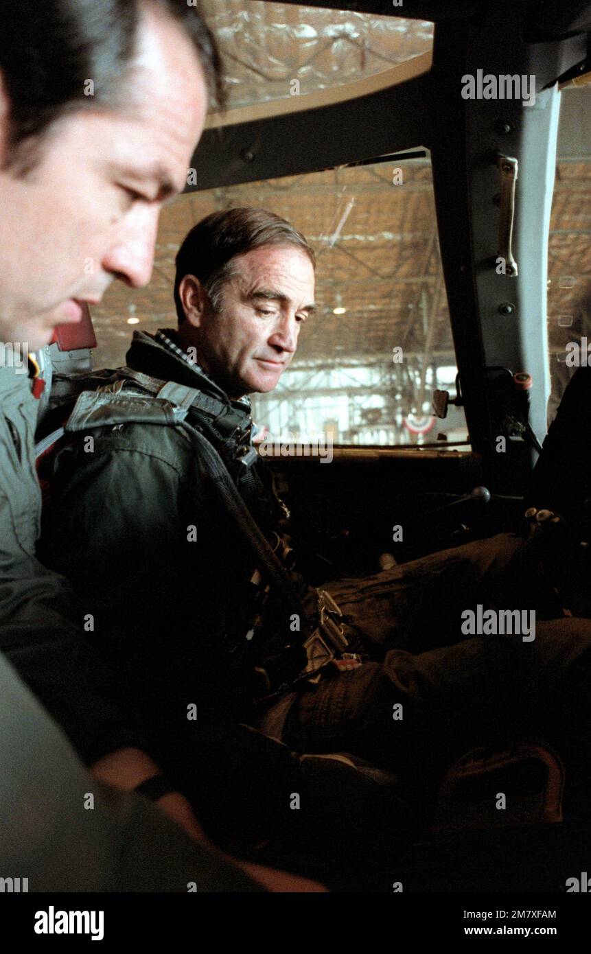 LCOL Leroy Schroeder, left, B-1 bomber chief test pilot, explains the ...