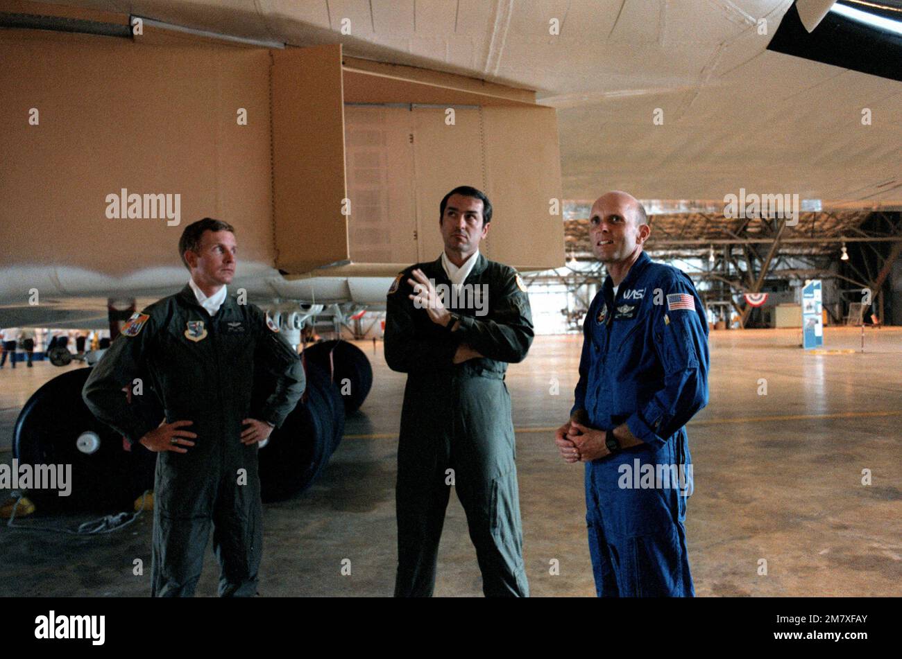 LCOL Leroy Schroeder, center, B-1 bomber chief test pilot, and another ...