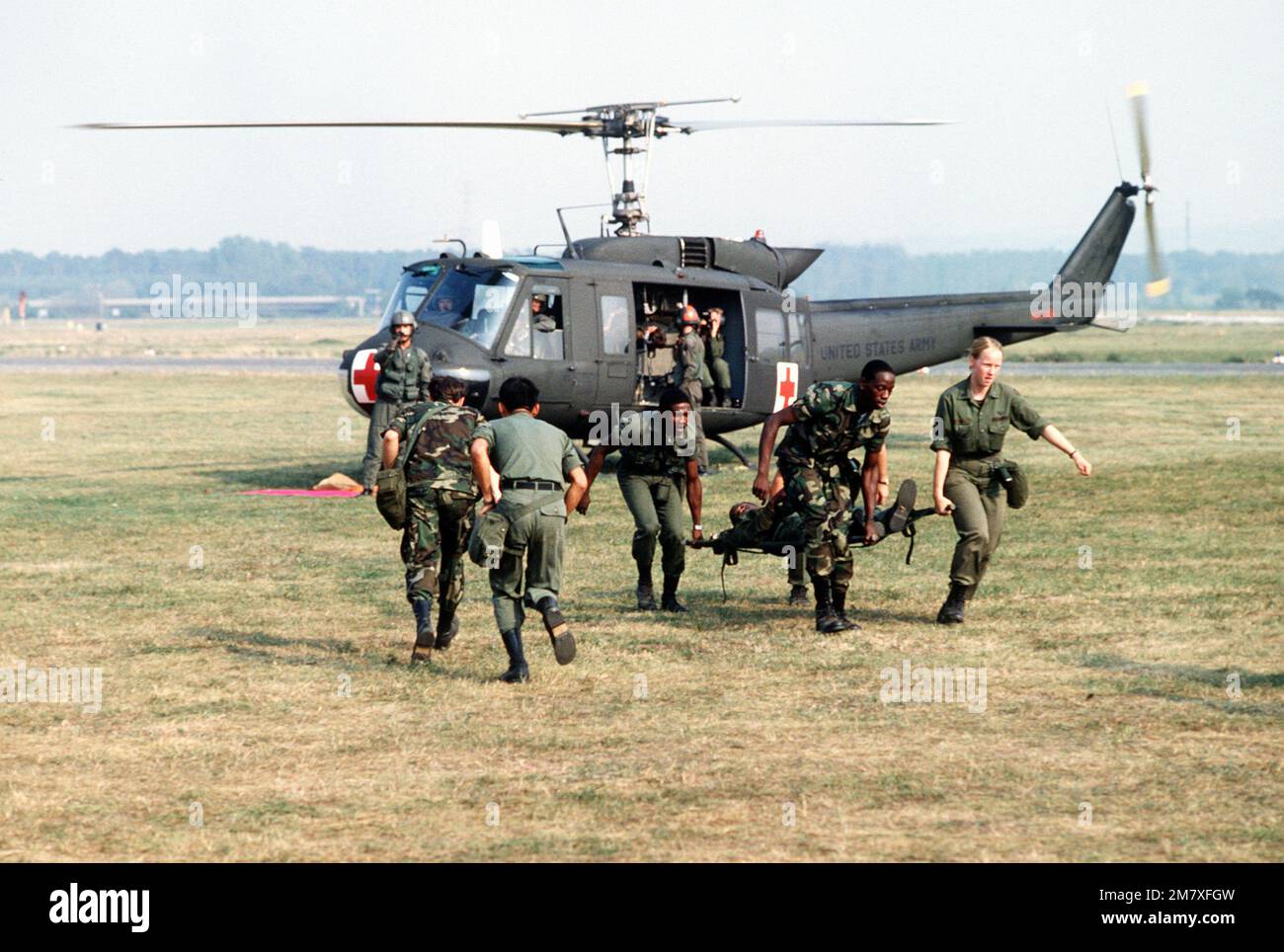 Medics from the 32nd Combat Support Hospital carry a "patient," on a ...