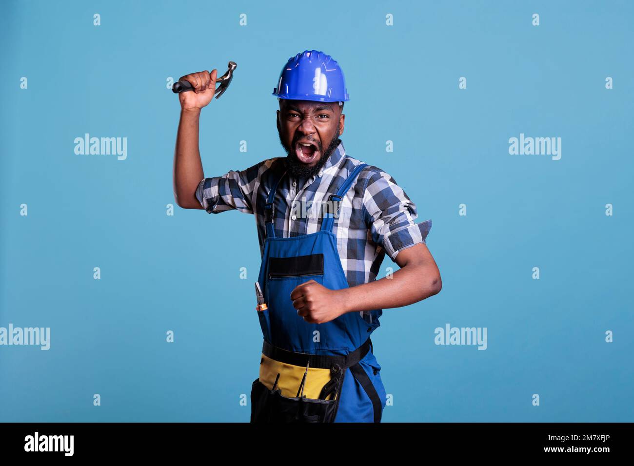 Angry strong african american construction worker in fighting stance ...