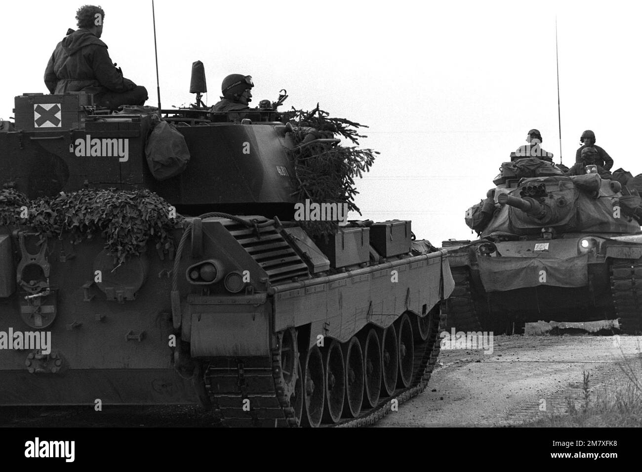 An M-60A1 tank from the 2nd Marine Division and a Danish Leopard II ...