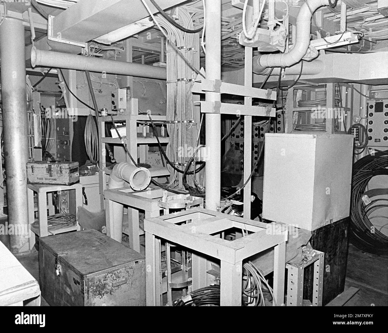 An interior view of the communications center on the guided missile ...