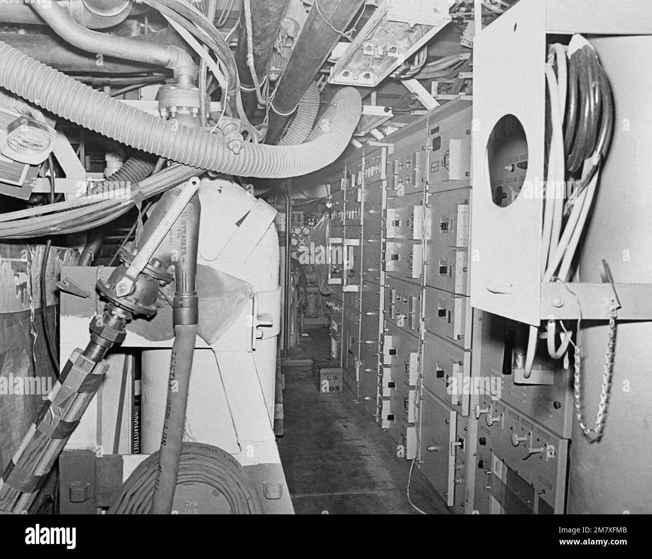 An interior view of auxiliary machine room No. 2 on the guided missile ...