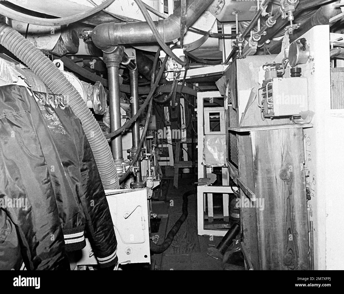 An interior view of auxiliary machine room No. 3 on the guided missile ...