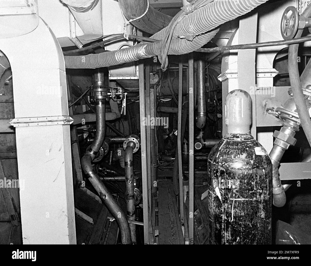 An interior view of the engine room on the guided missile frigate ...