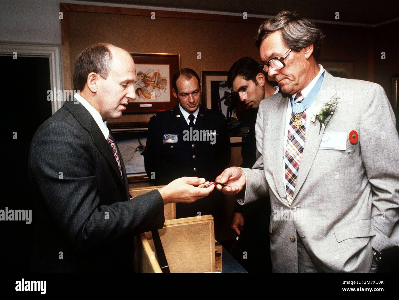 Retired serviceman Forrest T. Vosler, a World War II air mission Medal ...