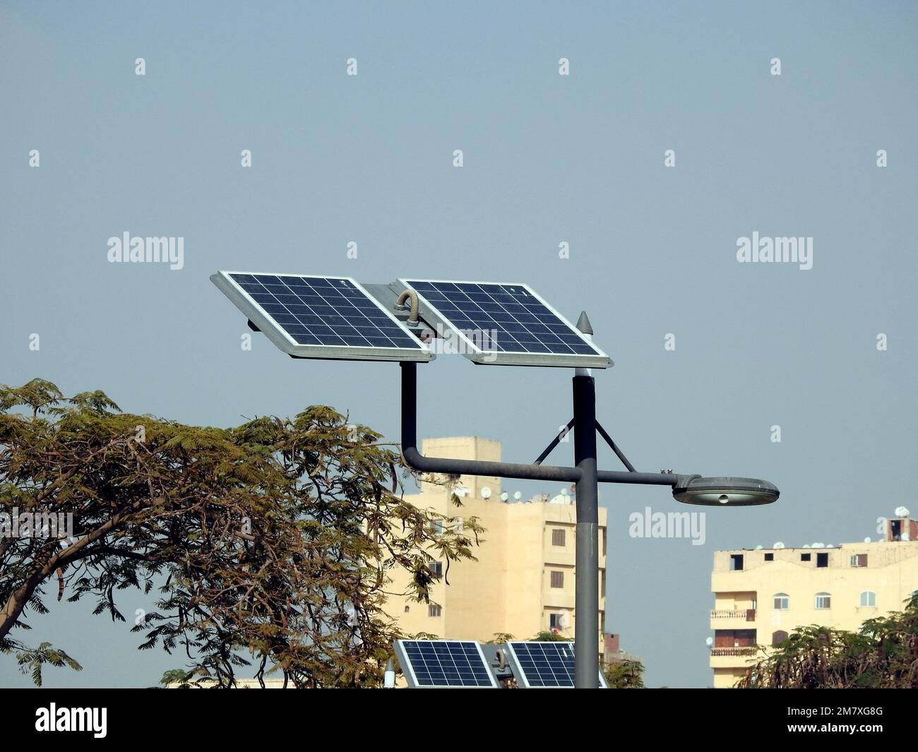 lamppost powered by clean energy of solar cells panel, or photovoltaic ...