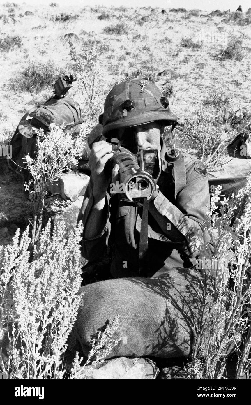 SGT. Dan Kikos, Co. C, 2nd Bn., 2nd Inf., aims a multiple integrated ...