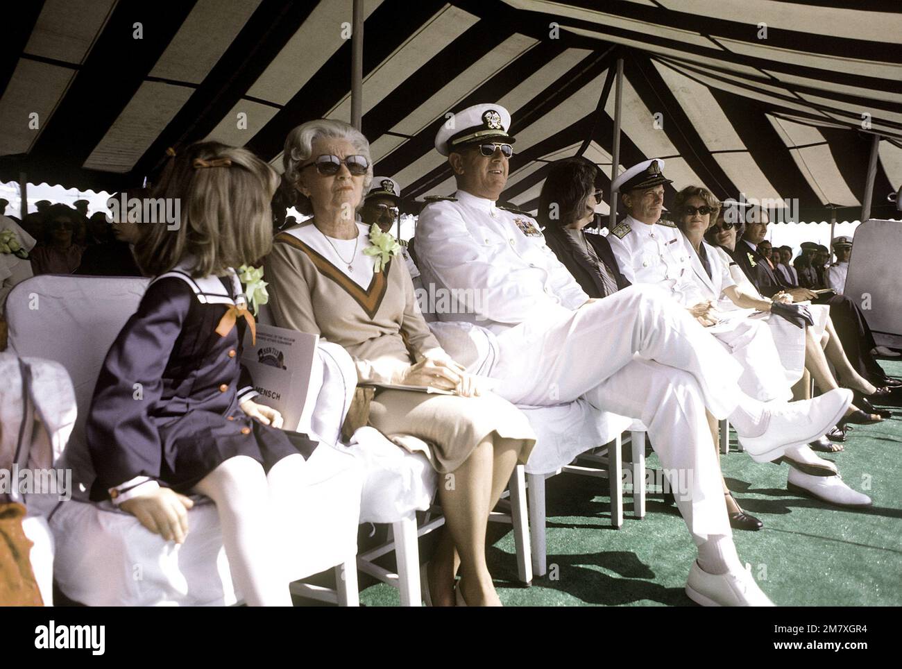 A side view of some of the honored guests (two rear admirals and their ...