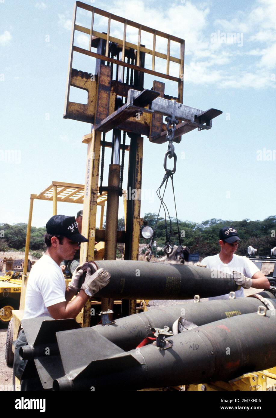 Members of the 3rd Munitions Maintenance Squadron load Mark 82 500 ...