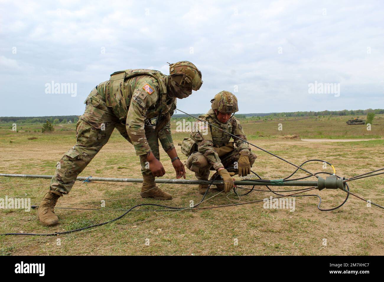 U.S. Army Cpl. Devante White, left, and U.S. Army Sgt. Alex Strickland ...
