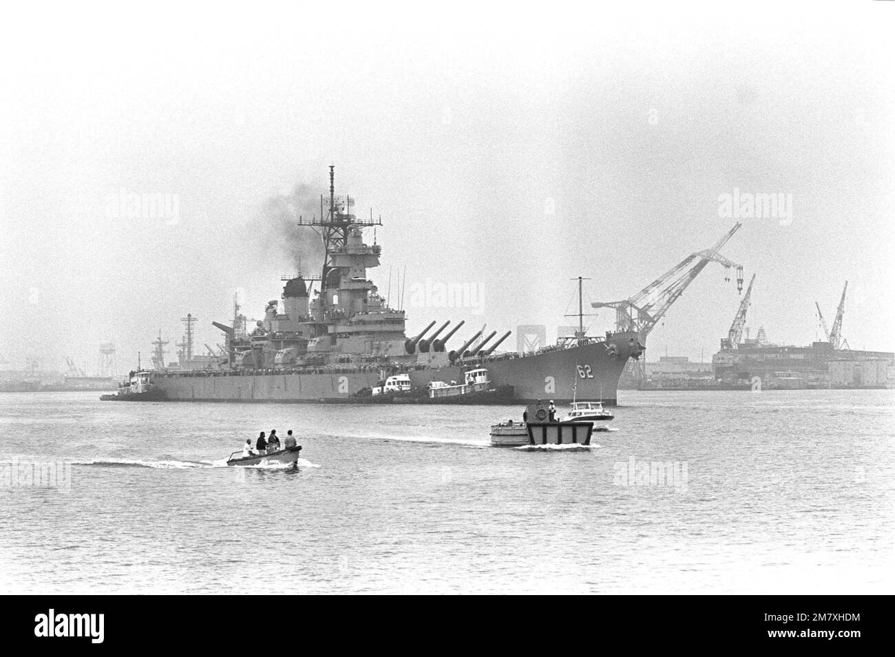 Starboard view of the battleship NEW JERSEY (BB-62) being maneuvered ...
