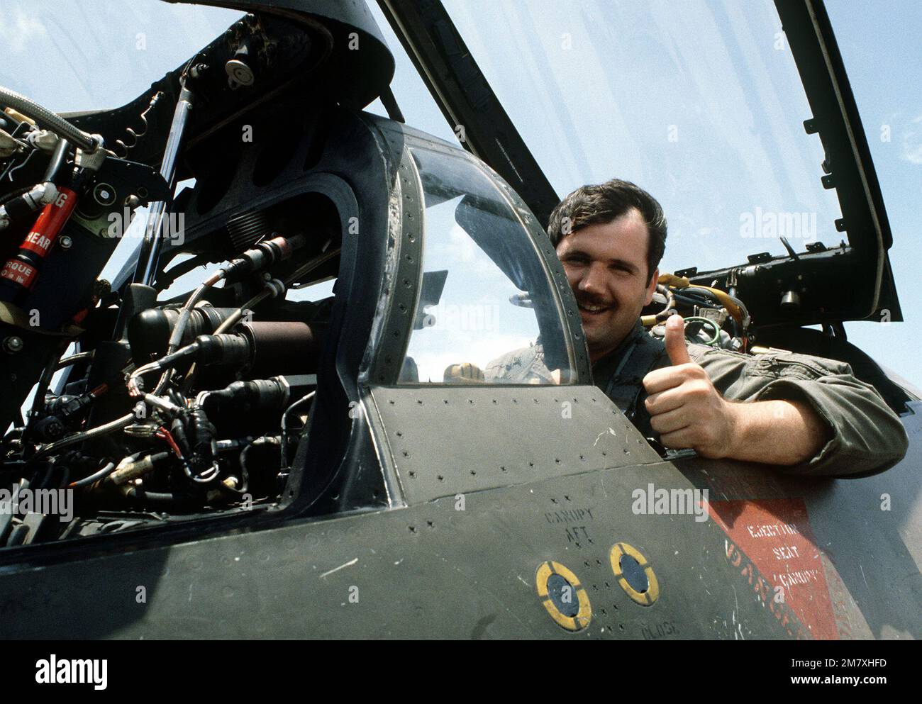 CPT Jim Fussel, 3rd Tactical Fighter Wing, prepares for flight aboard ...