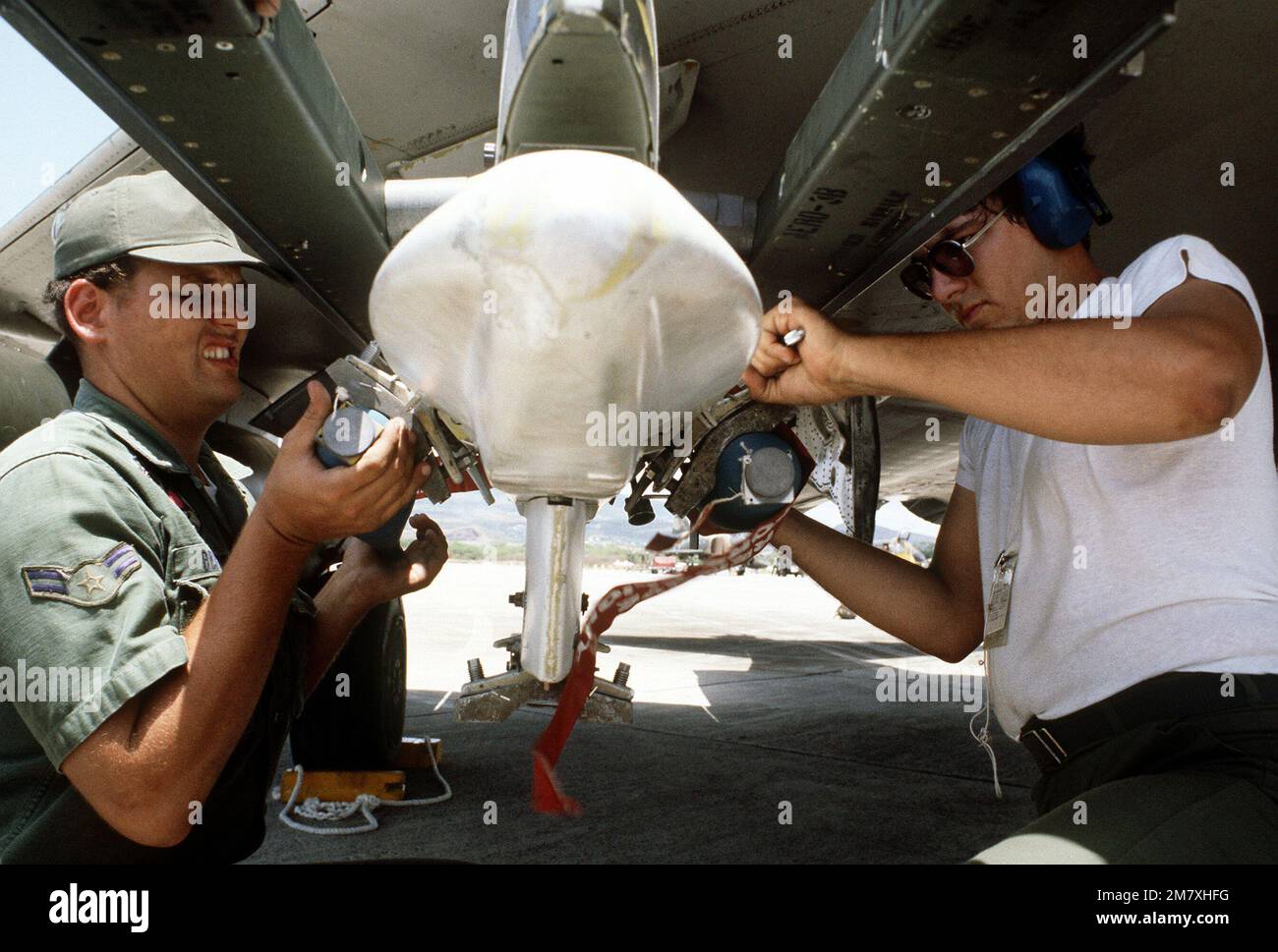 SSGT Darrell J. Bucy, left, and A1C Scott Catino, right, load Bomb ...