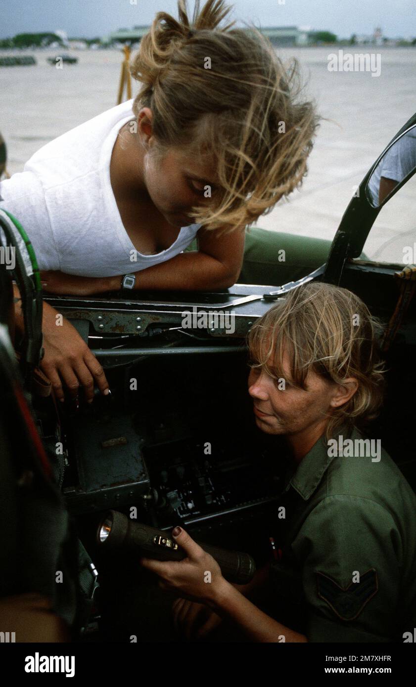 A1C Sheree L. Cabaniss, left, and SGT Judy K. Busselman, right, check ...