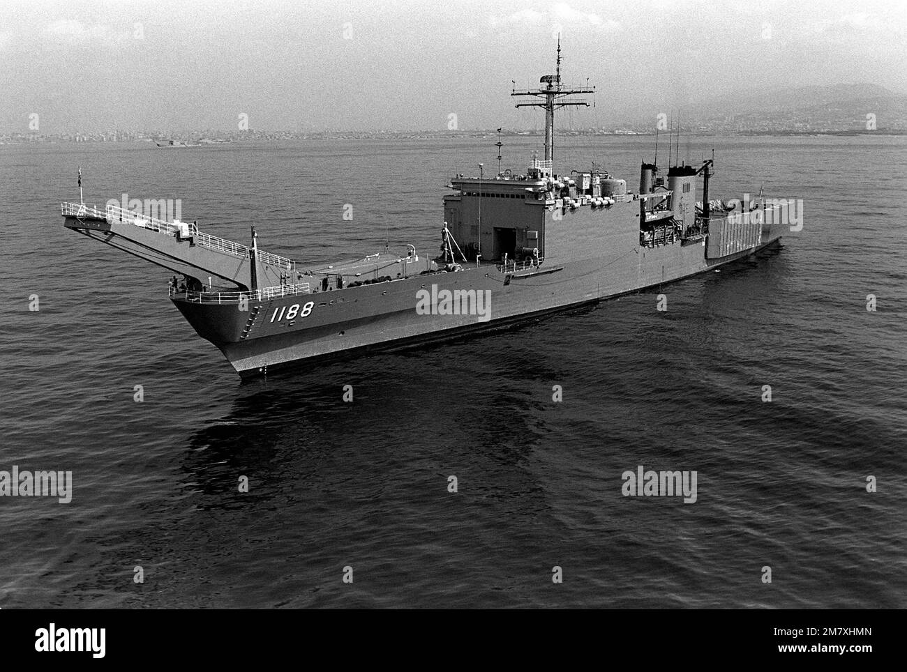 An aerial port bow view of the tank landing ship USS SAGINAW (LST 1188 ...