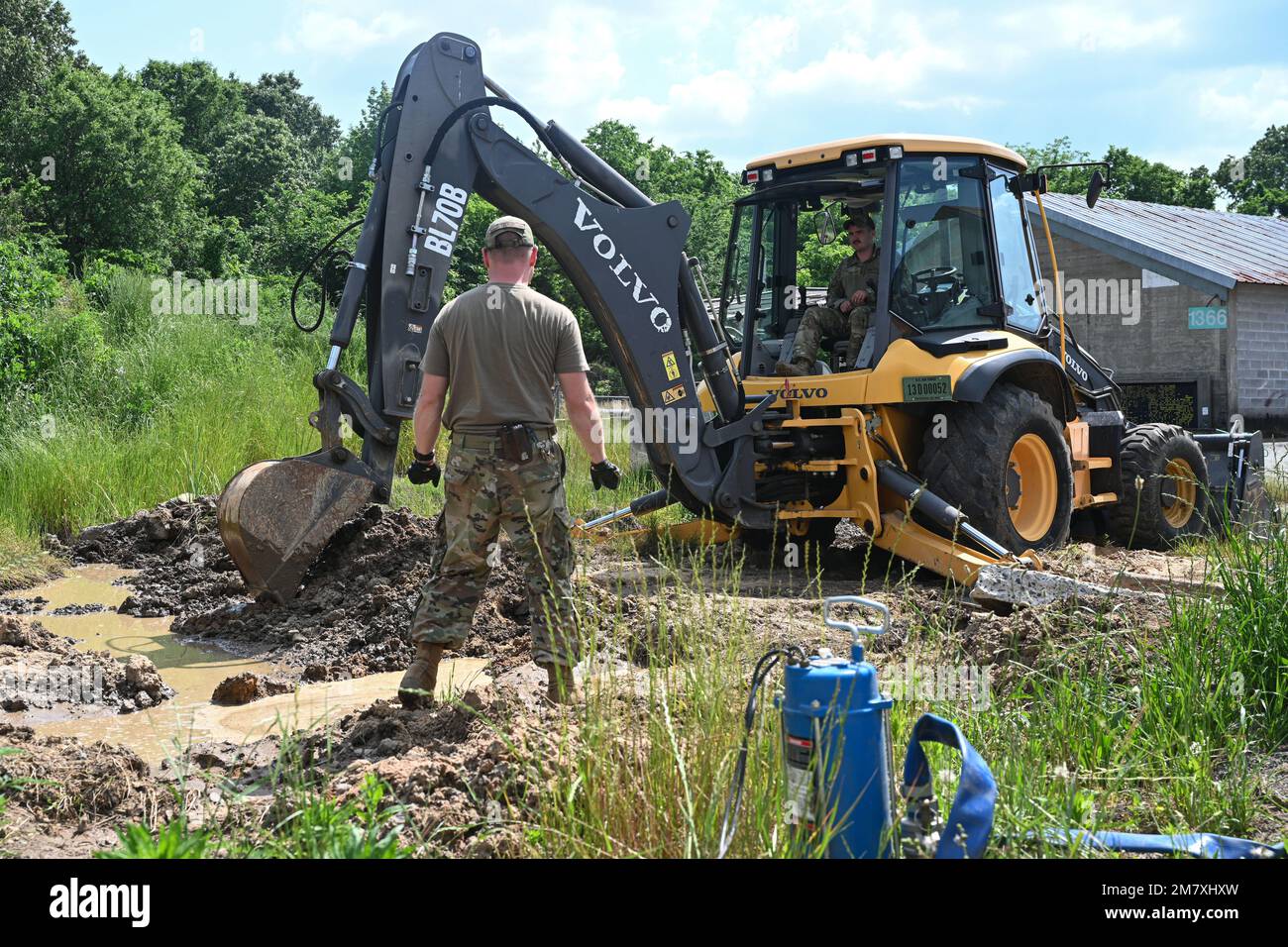 Airmen assigned to the 19th Civil Engineer Squadron create a fuel berm ...