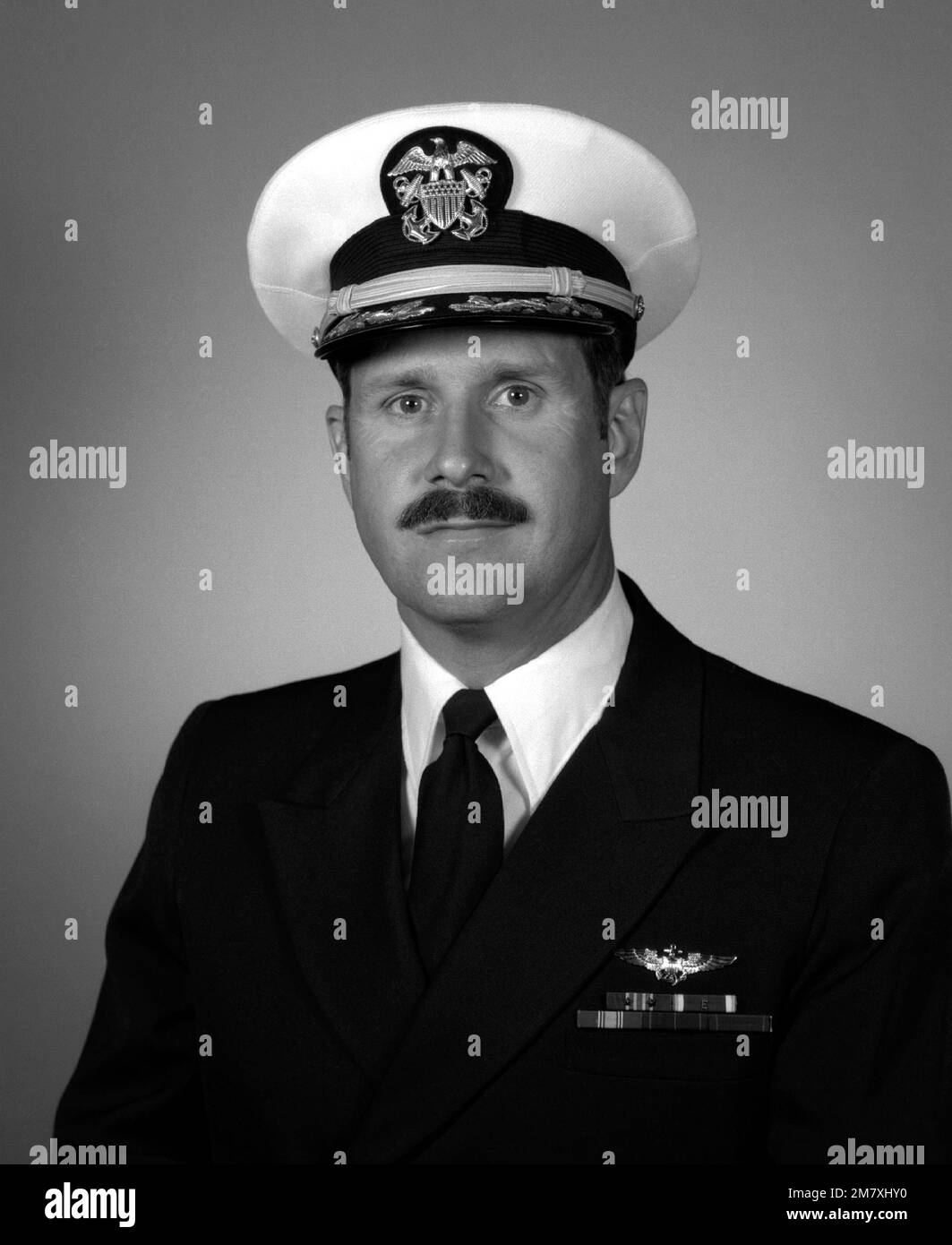 CDR Michael E. Perrault, USN (covered). Country: Unknown Stock Photo ...