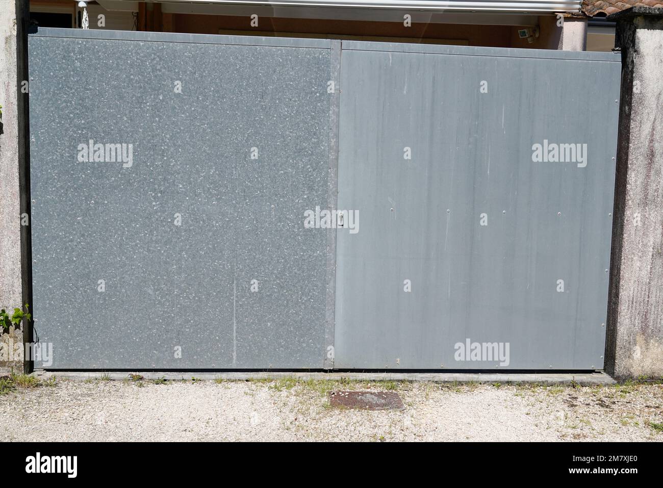 steel grey metal gate fence on modern house street Stock Photo - Alamy